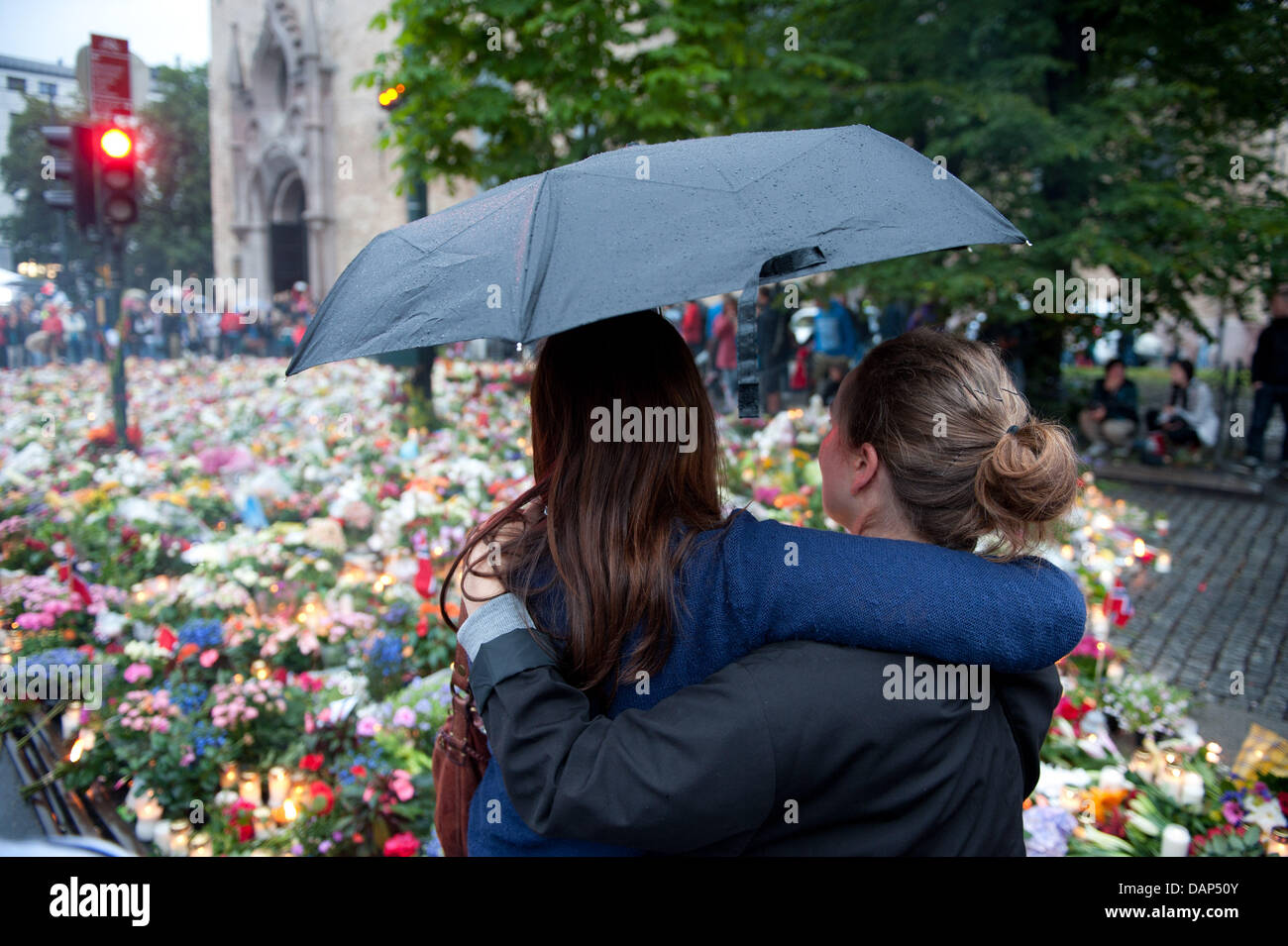 Norwegian flags, flowers and candles commemorating the victims of the ...