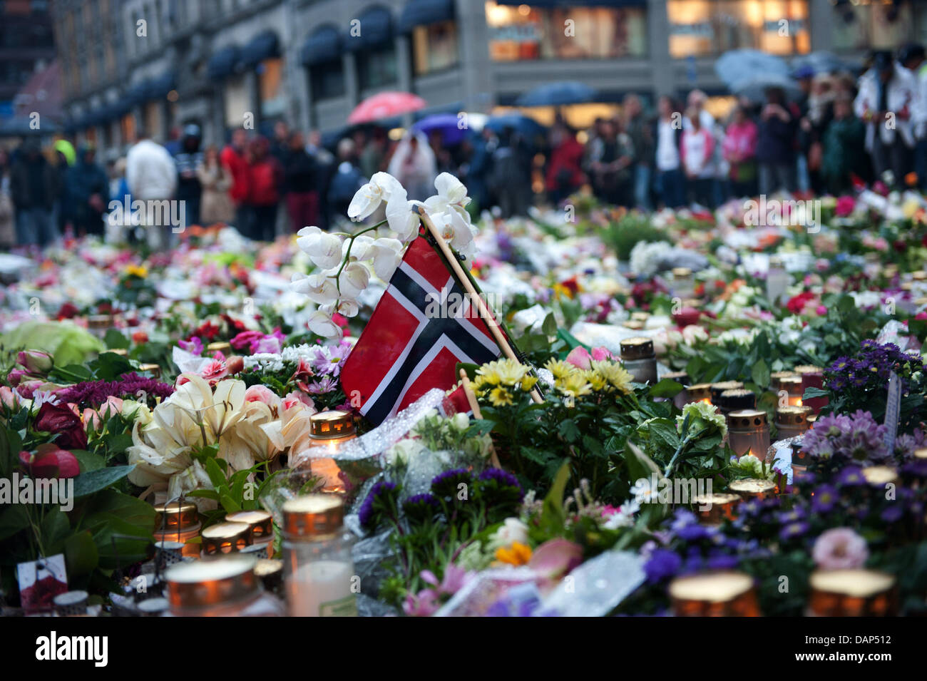 Norwegian flags, flowers and candles commemorating the victims of the ...