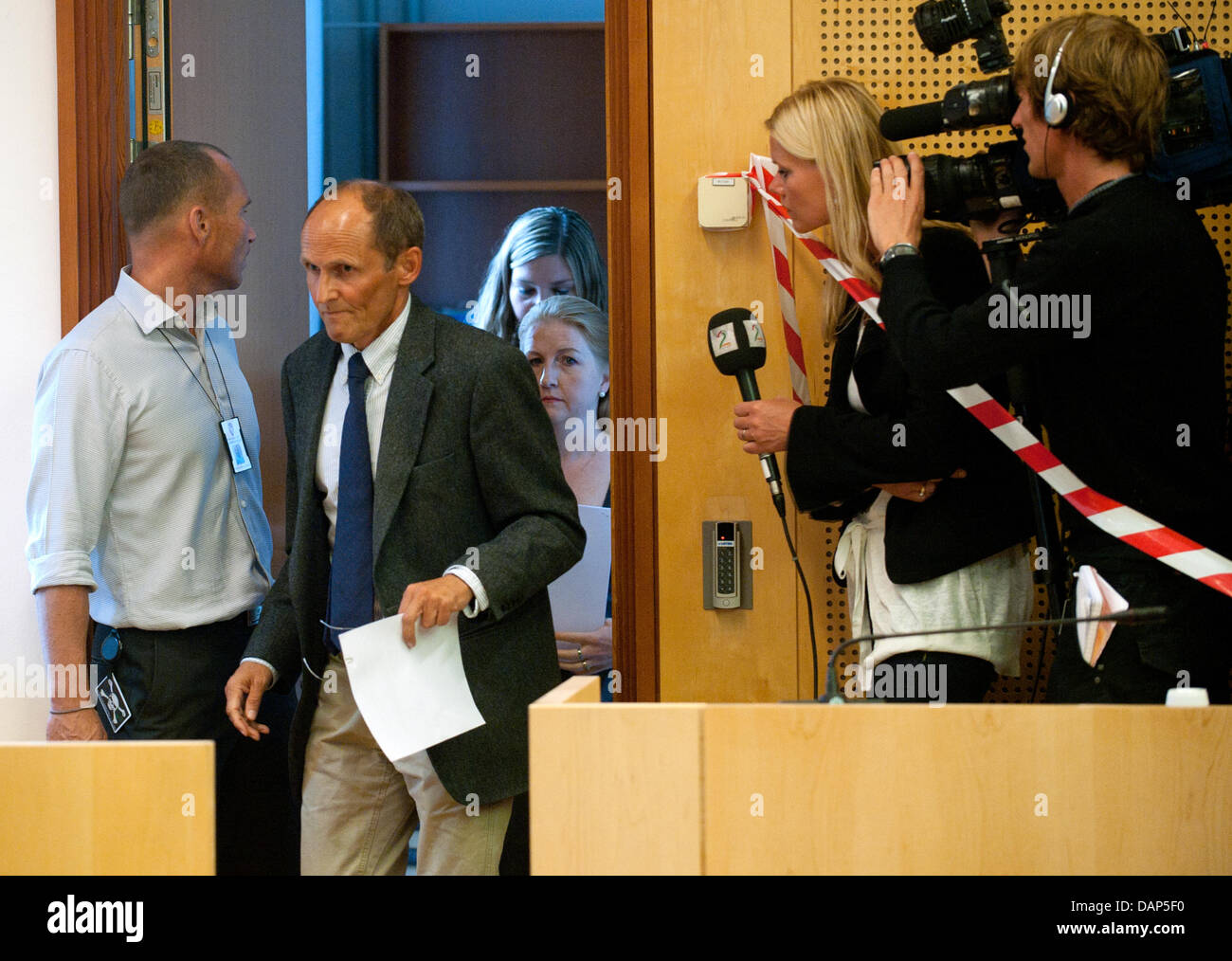 Judge Kim Heger is entering a courteroom in central Oslo, Norway, 25 ...