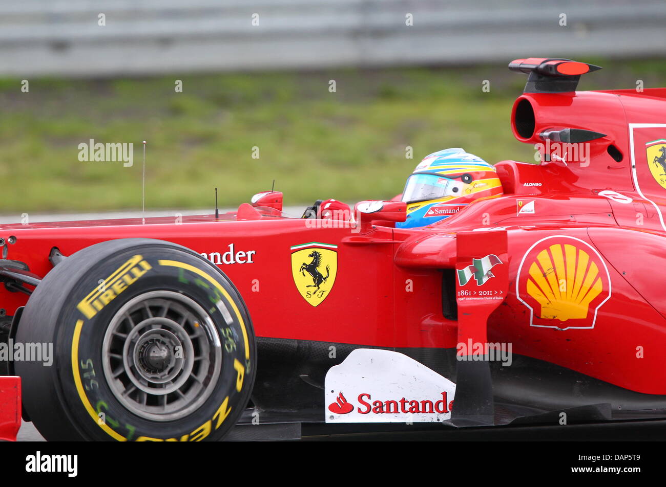 Spanish Formula One driver Fernando Alonso of Ferrari steers his car ...