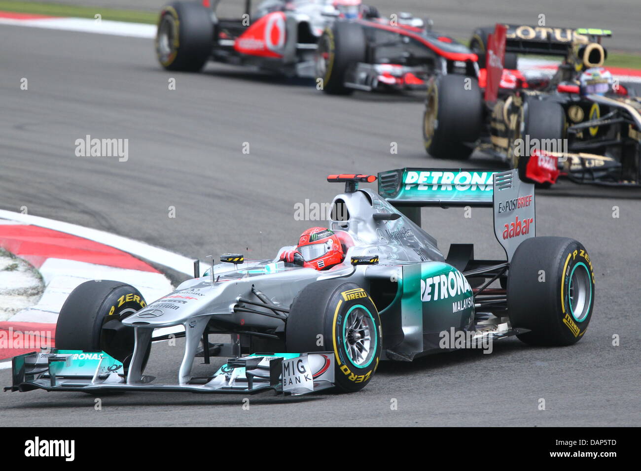 German Formula One driver Michael Schumacher of Mercedes GP steers his ...
