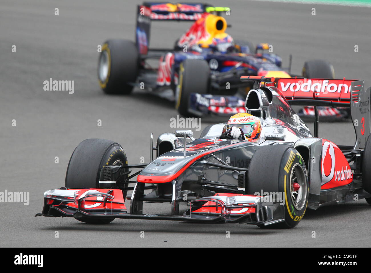 British Formula One driver Lewis Hamilton of McLaren Mercedes leads in ...
