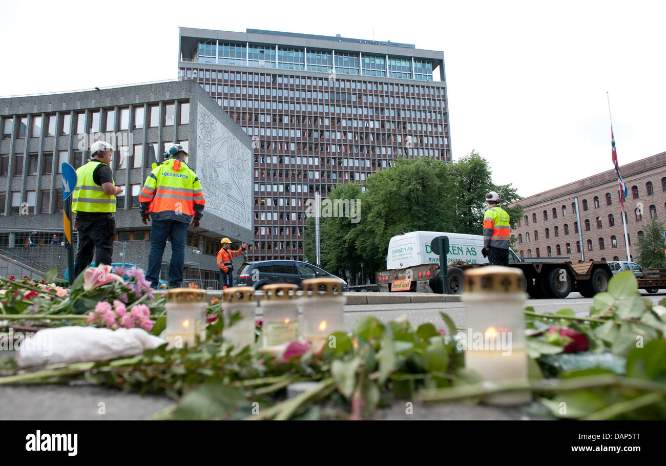 Flowers and candles are lying at the memorial to the victims in Oslo ...
