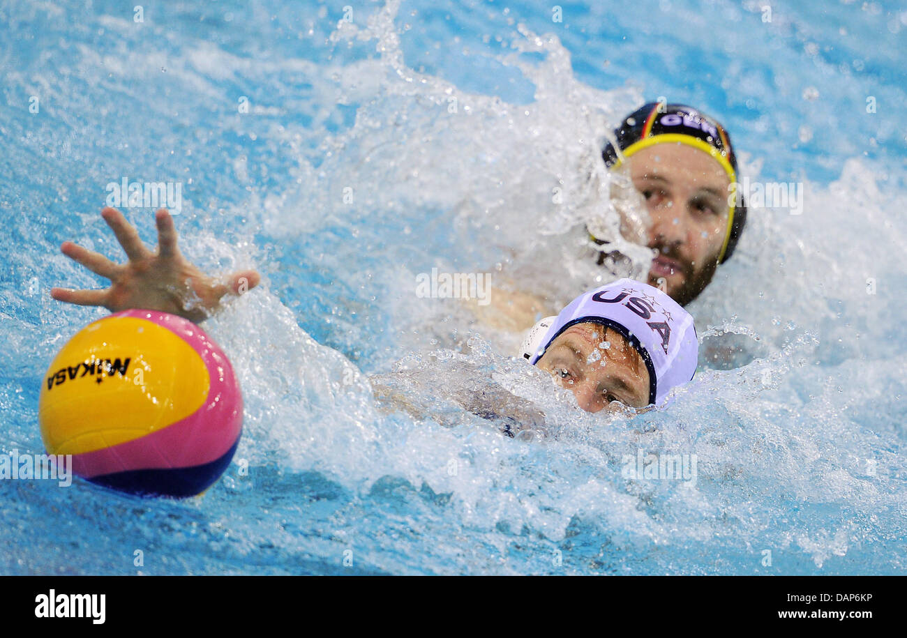 Germany's Tobias Kreuzmann (R) and Ronald Beaubien of USA challenge ...