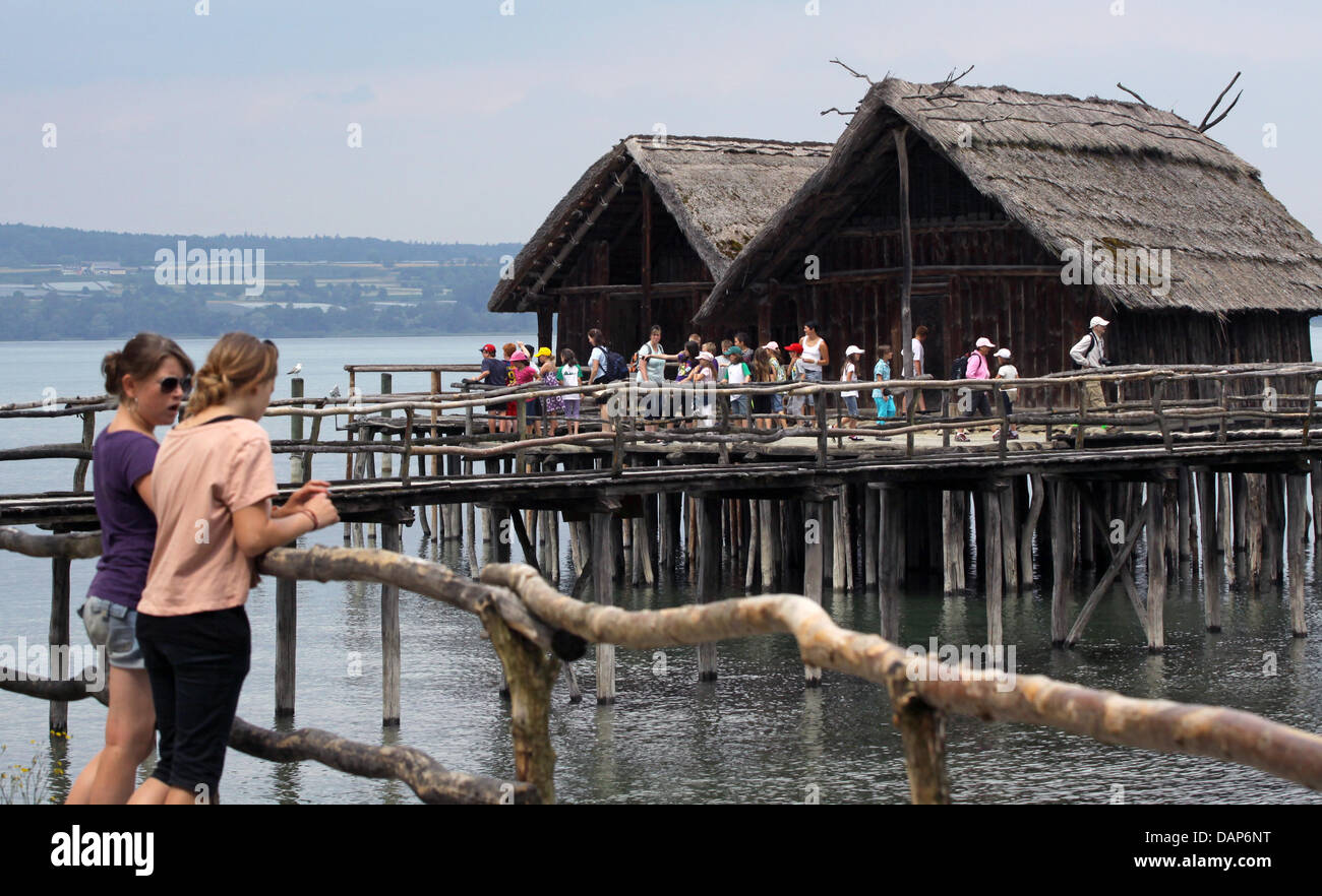 Replicas of Stone Age stilt houses stand in the water of Lake Constance ...