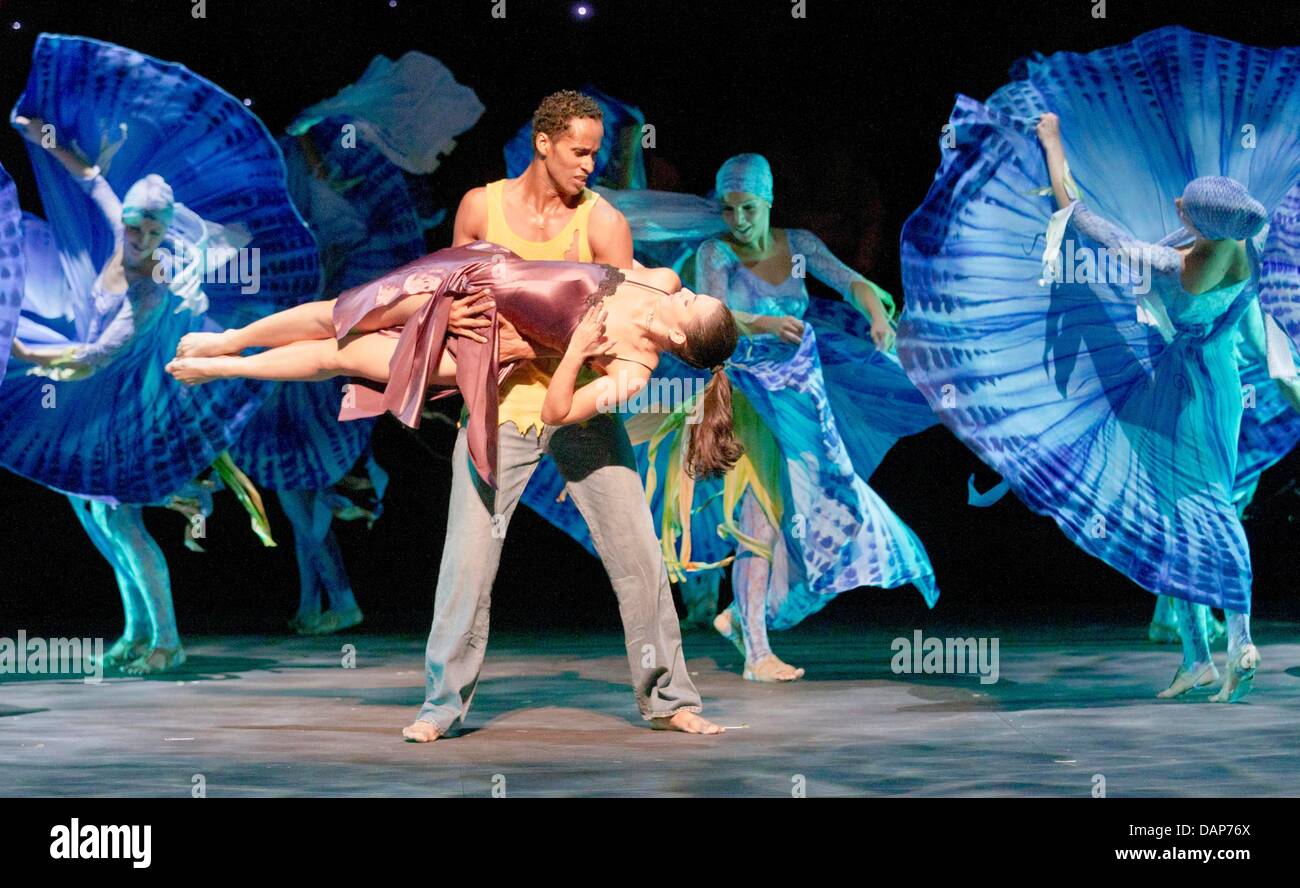 Anna Lopez as 'Regla' dances with an ensemble dancer during the ...