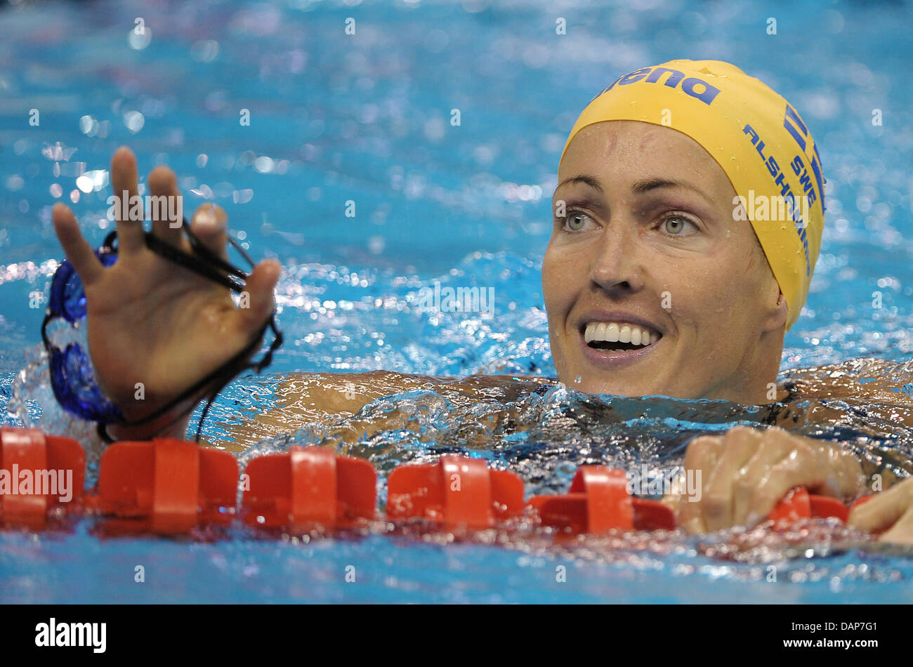 Swimmer Therese Alshammar of Sweden celebrates after the 50m Butterfly ...