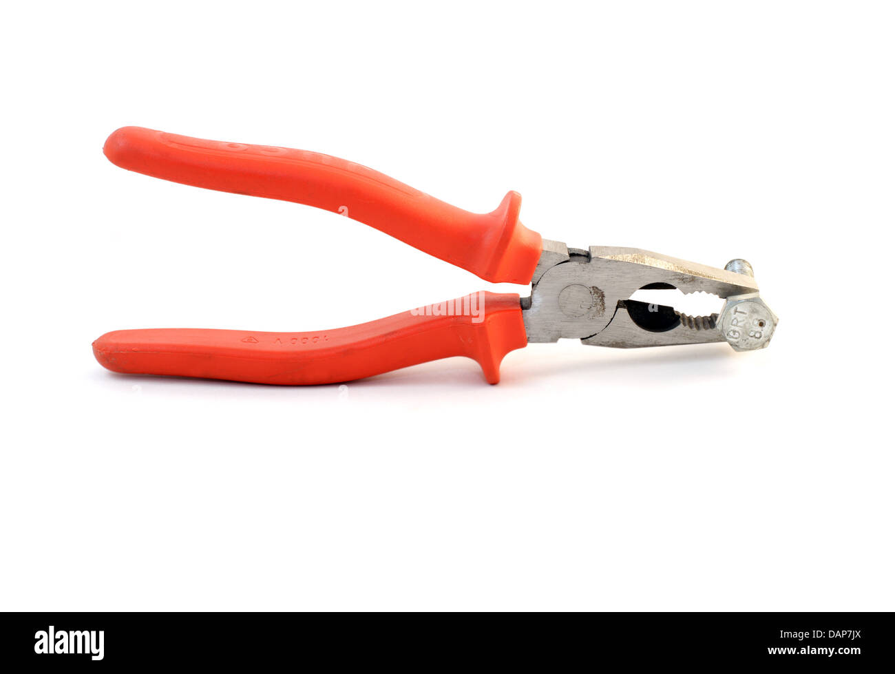 pliers holding screw isolated over white background Stock Photo - Alamy