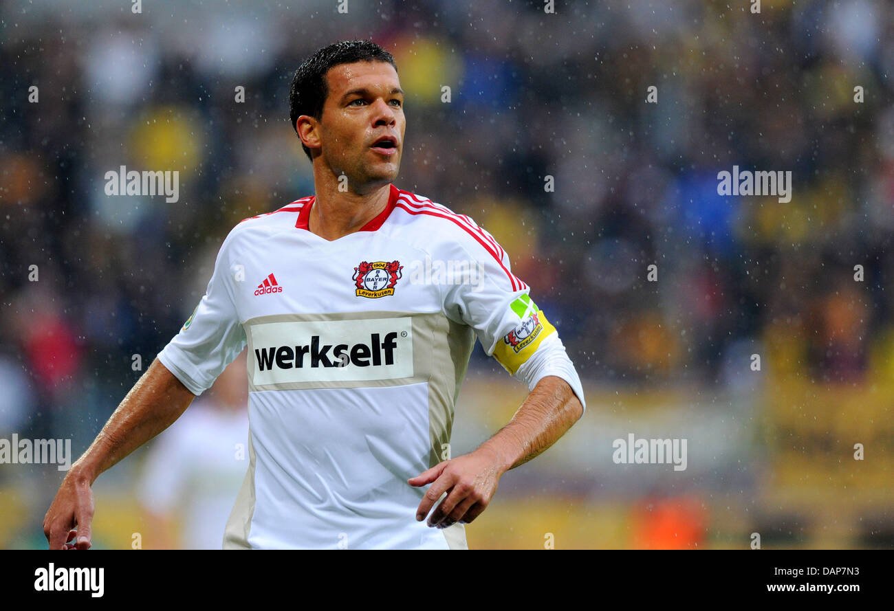 Leverkusen's Michael Ballack stands in the rain after the DFB Cup 1st ...