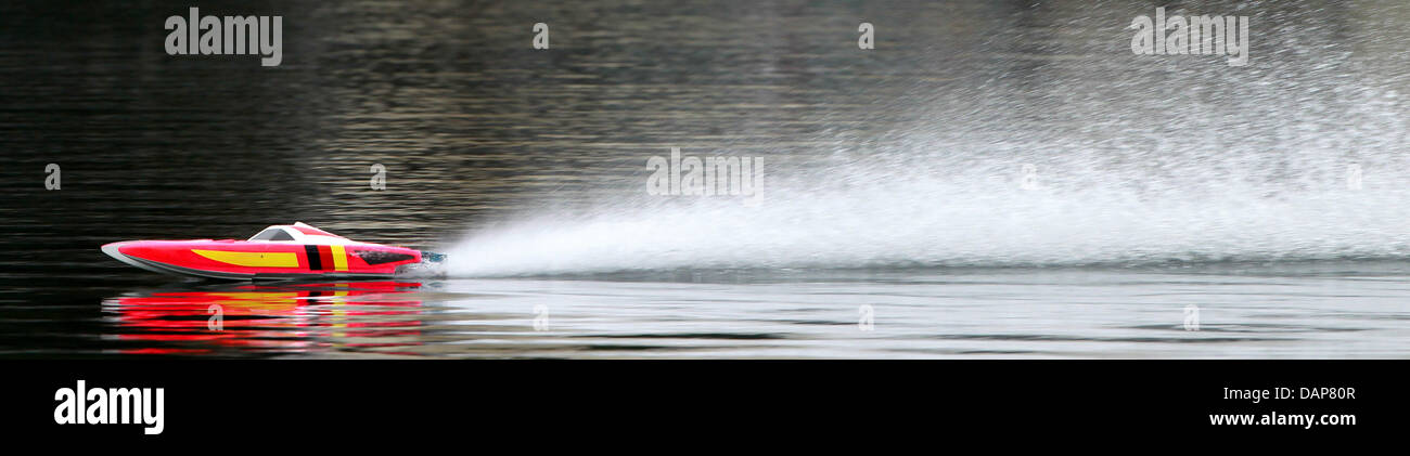 A model catamaran monohull offshore speed boat speeds across a regatta ...