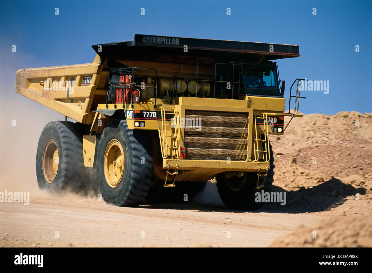 A Cat mining truck used in the alluvial diamond mining industry in the ...