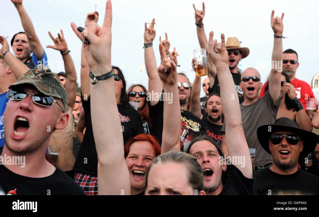 Heavy metal fans cheer at the music festival Wacken Open Air in Wacken ...
