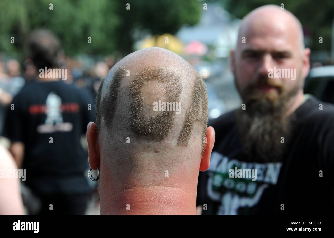 A heavy metal fan shows his Wacken Open Air (WOA)- haircut at the ...