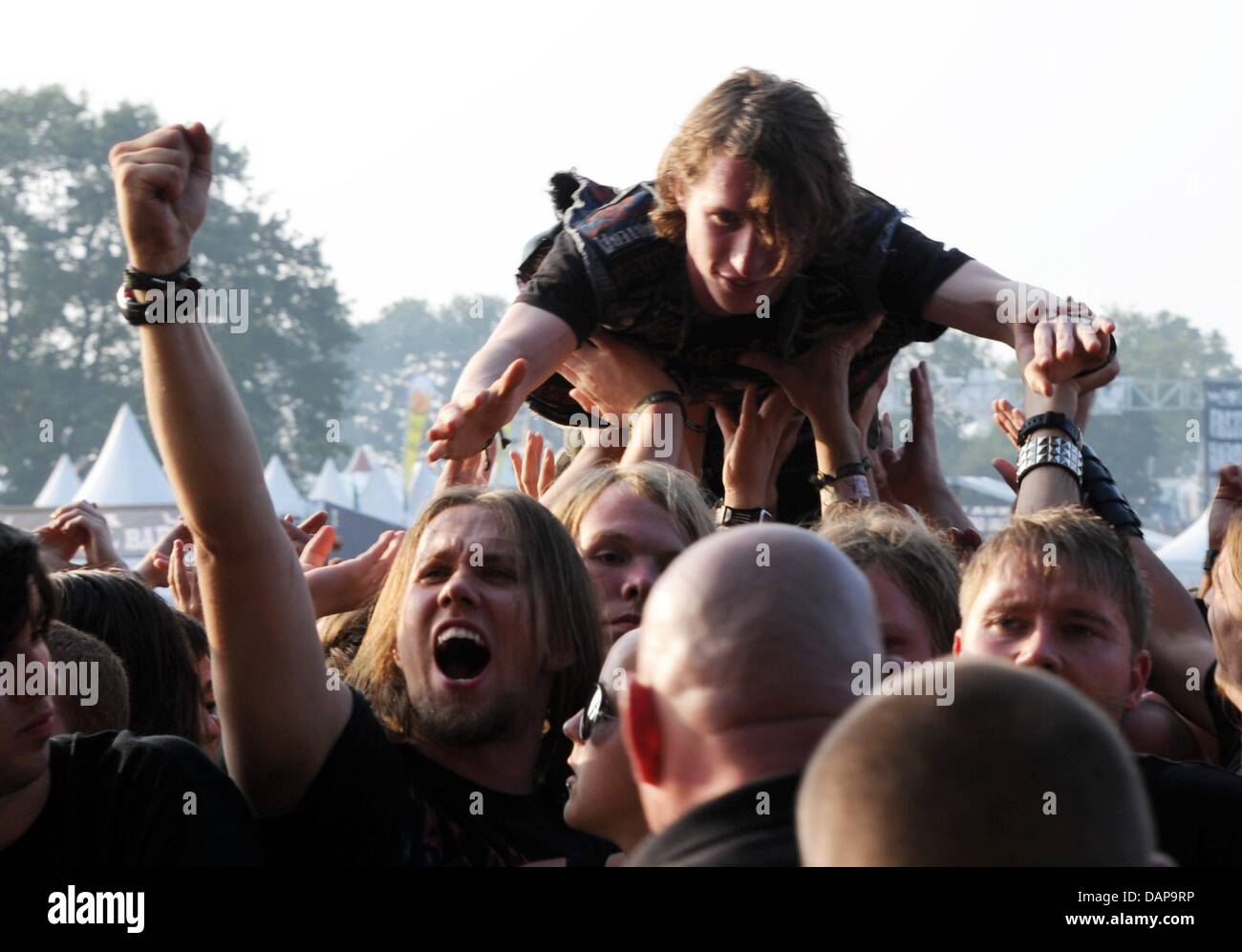 A metal fan crowdsurfs during the first concert of the heavy metal ...