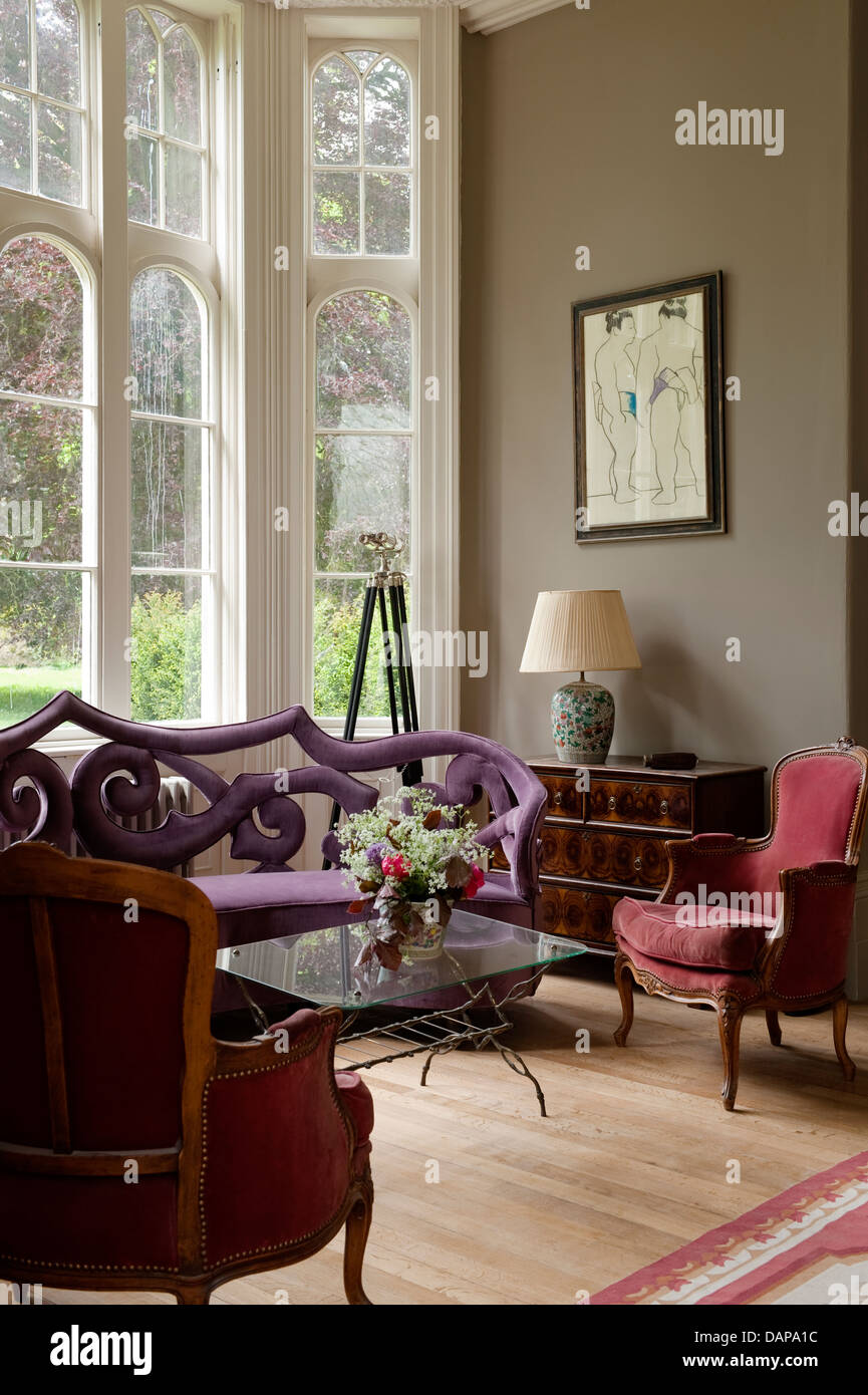 Ornate sofa set in window of Gloucestershire country estate house Stock ...
