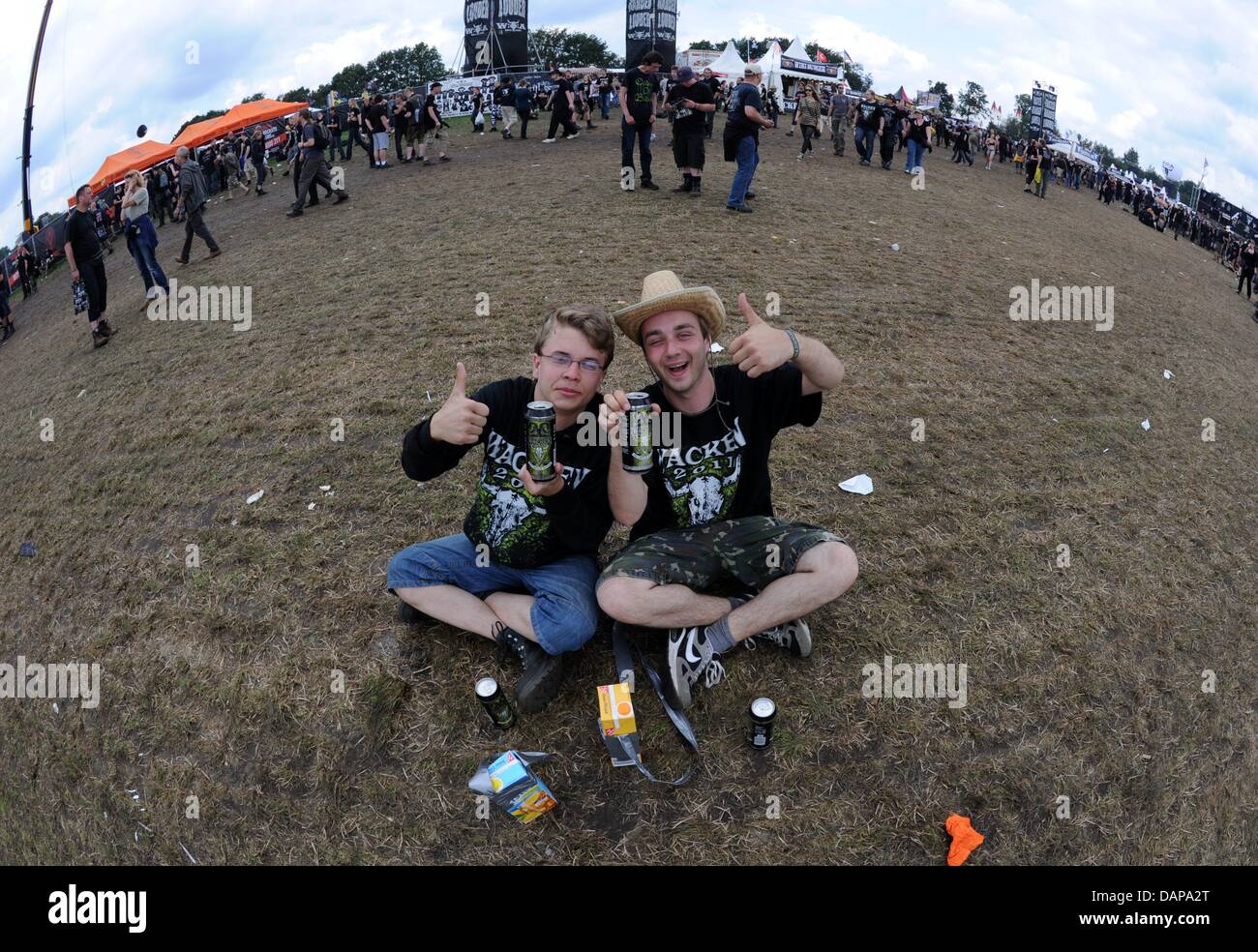 Two heavy metal fans enjoy themselves on the grounds of the Open-Air ...