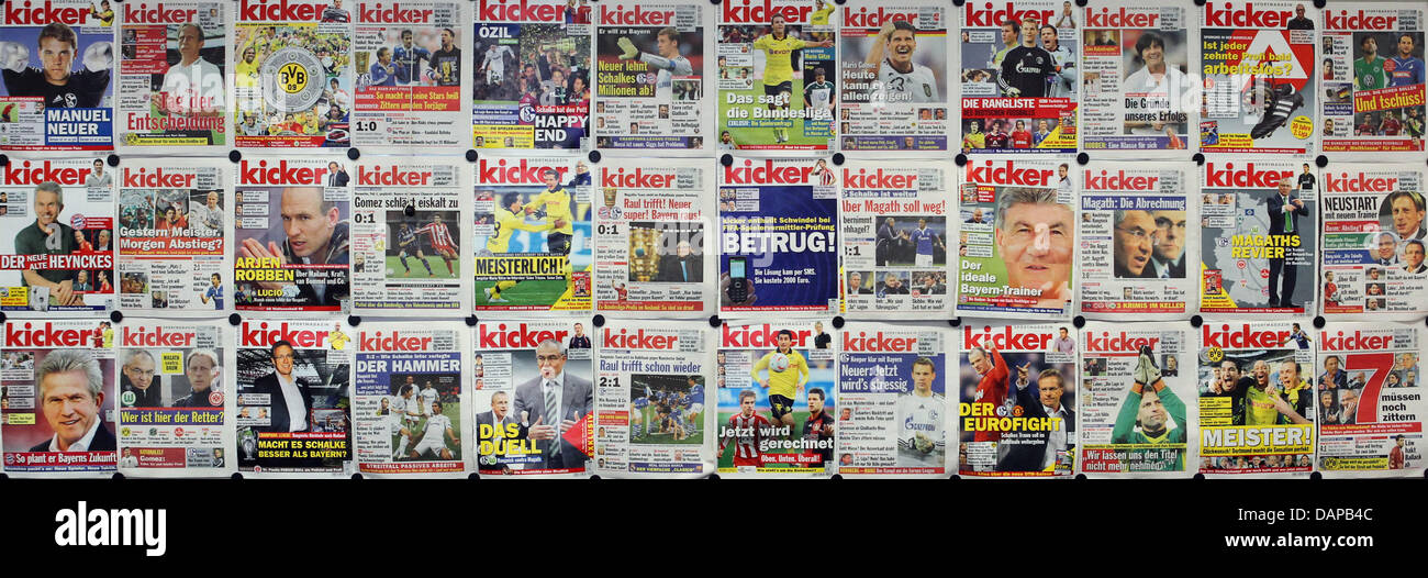 Numerous front pages of the sports magazine 'Kicker' hang in the Kicker ...
