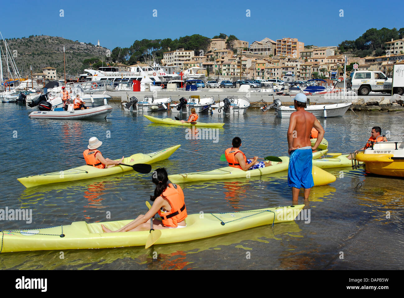 Spain, People canoeing in harbour of Port de Soller Stock Photo - Alamy