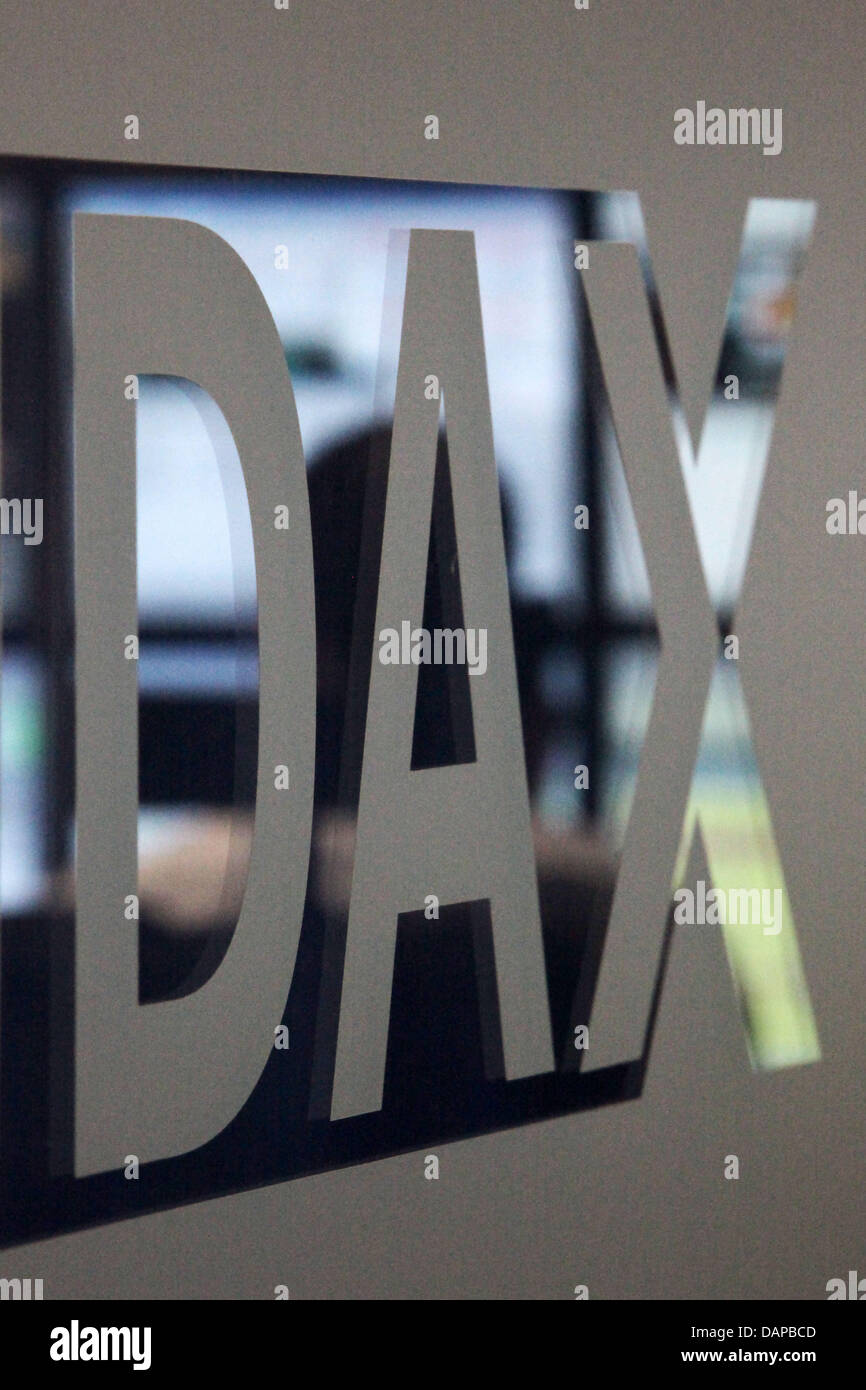 The Frankfurt stock exchange is reflected in a logo of the German Dax ...