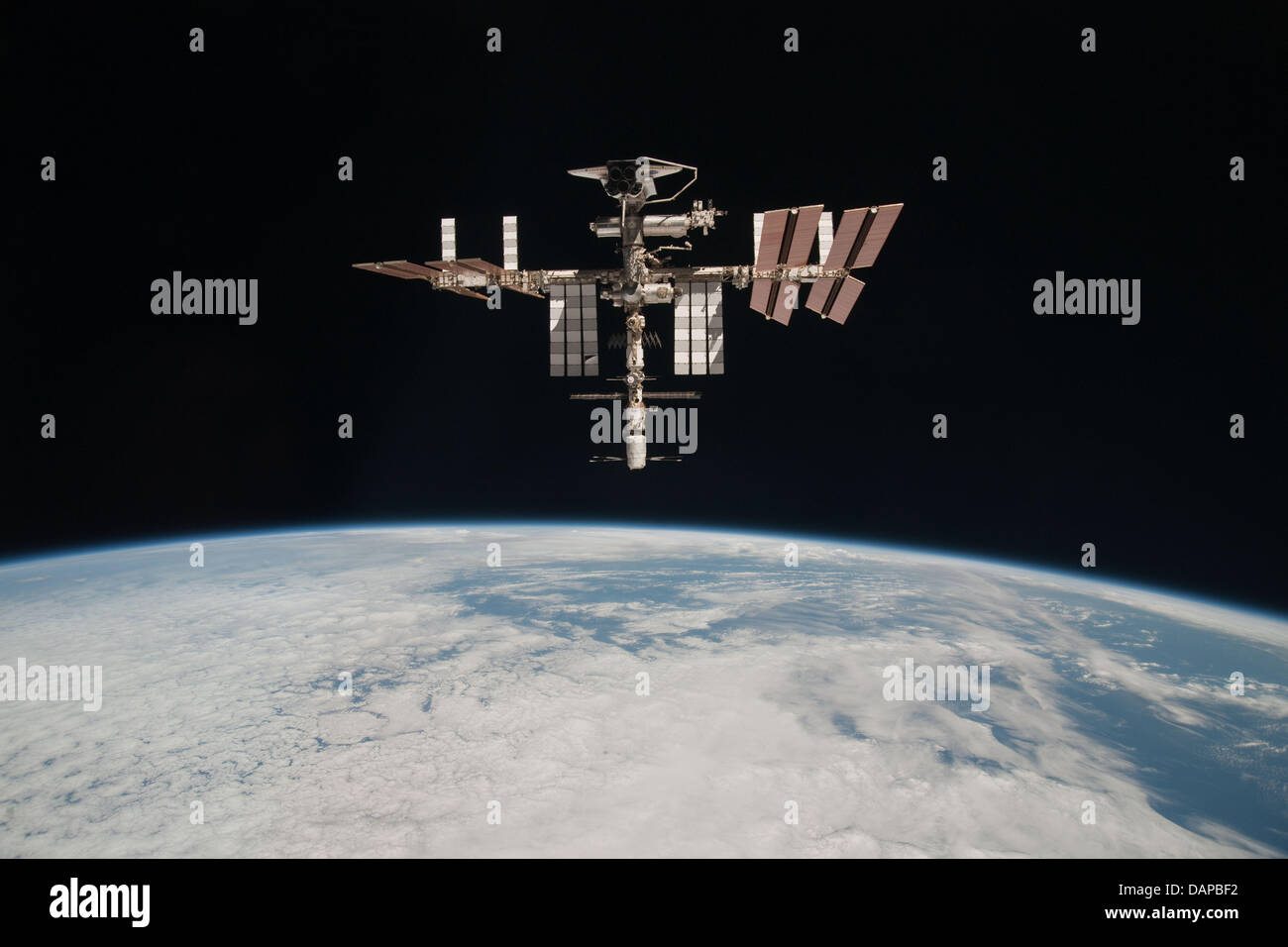 This image of the International Space Station and the docked space ...