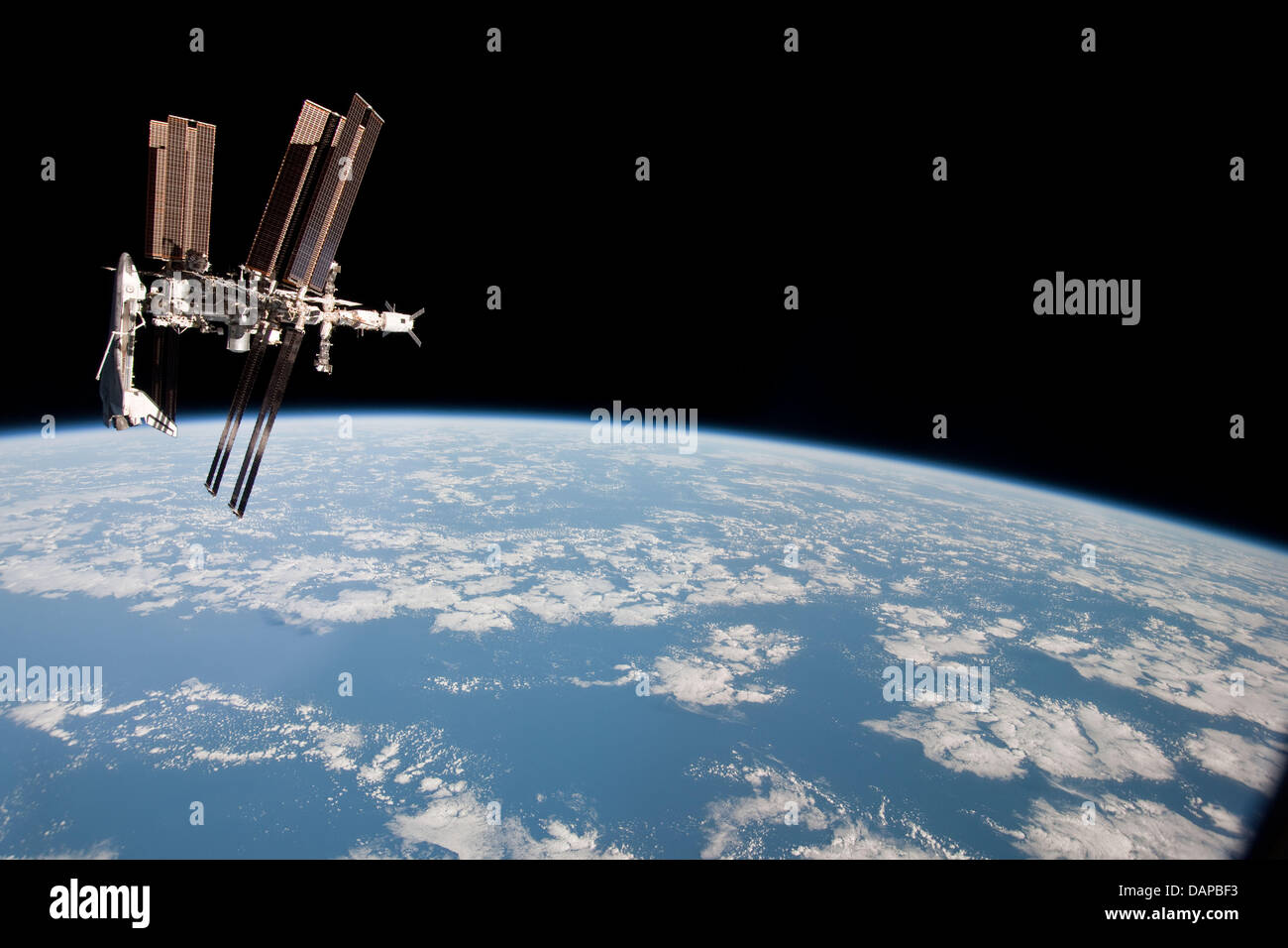 This image of the International Space Station and the docked space ...