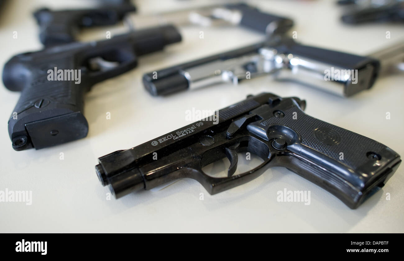 Police officer with seized guns hi-res stock photography and images - Alamy
