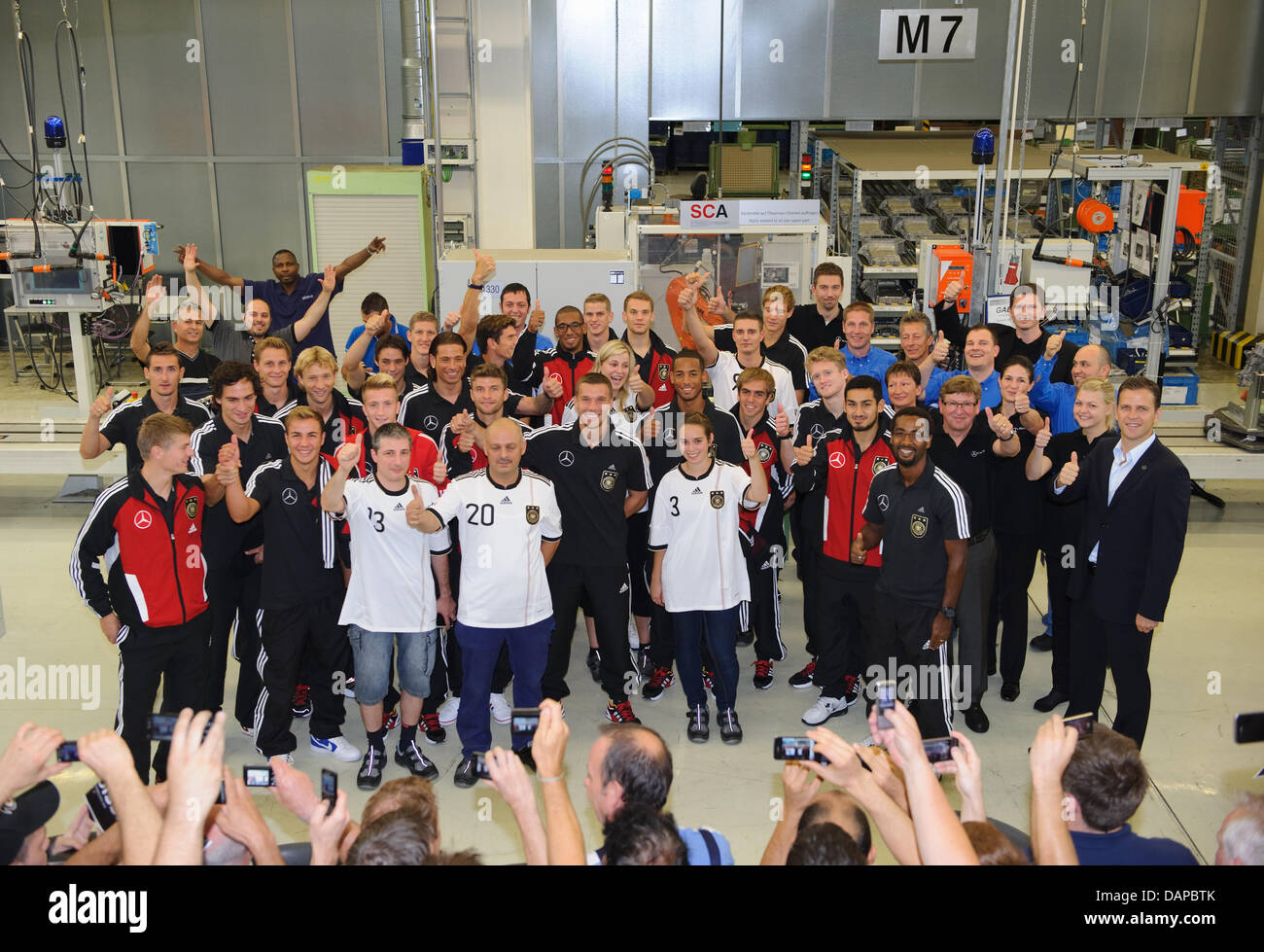 The German national team and staff members pose for a picture during ...
