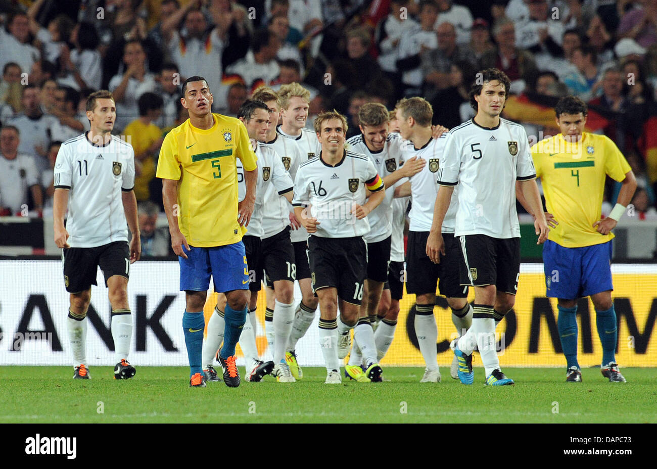 German Andre Schuerrle (C) celebrates with team mates after scoring the ...