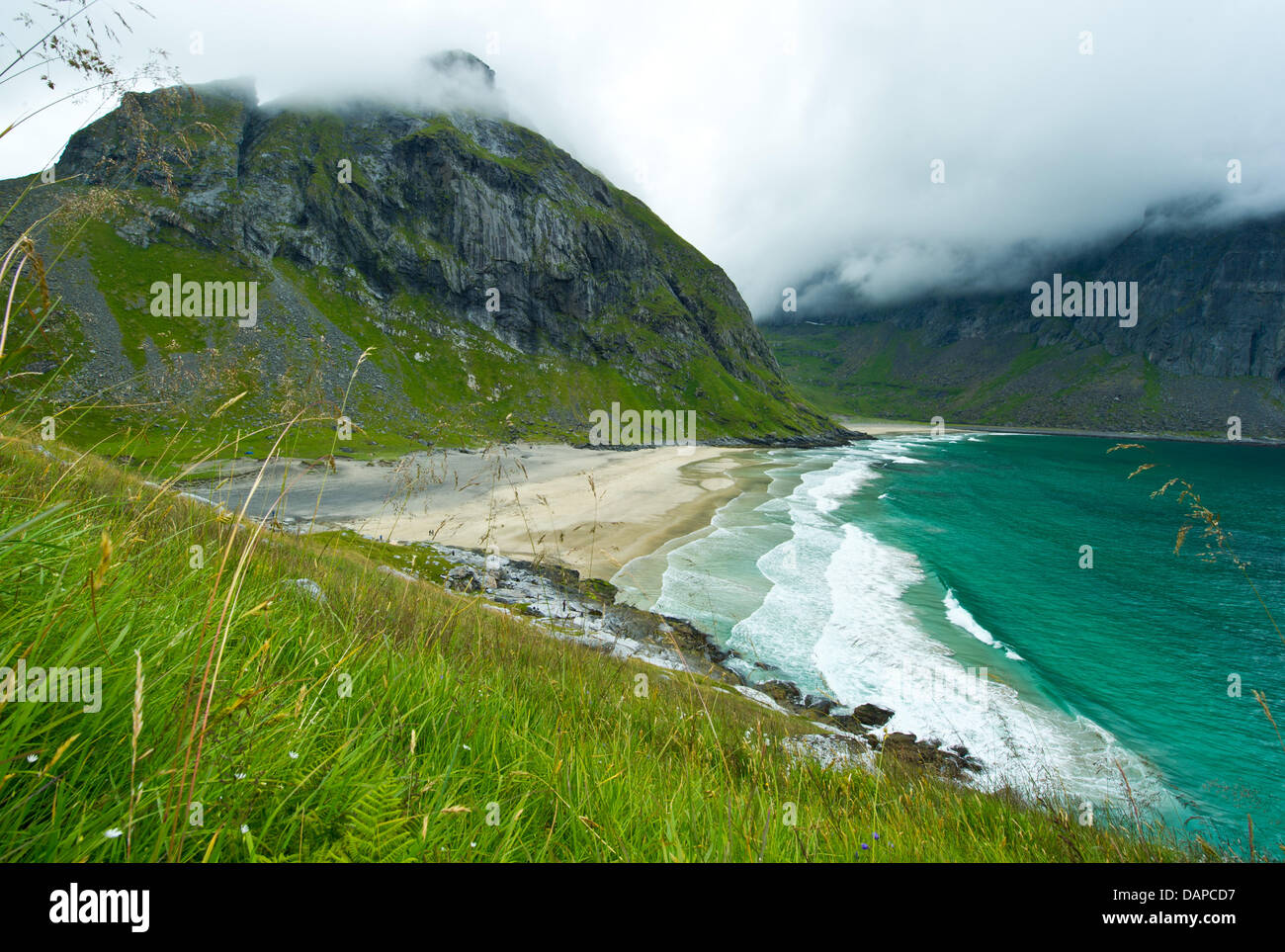 The bay Kvalvika, that is surrounded by 500m high mountains and ...