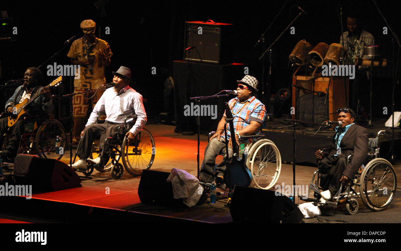 Musicians of the band 'Staff Benda Bilili' perform during the festival ...