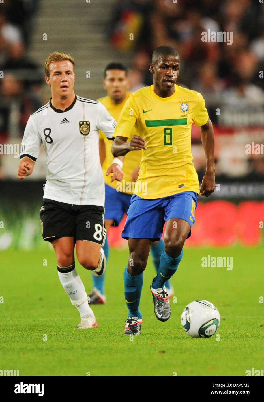 Germany's Mario Goetze (L) and Brazil's Ramires plays the ball during ...