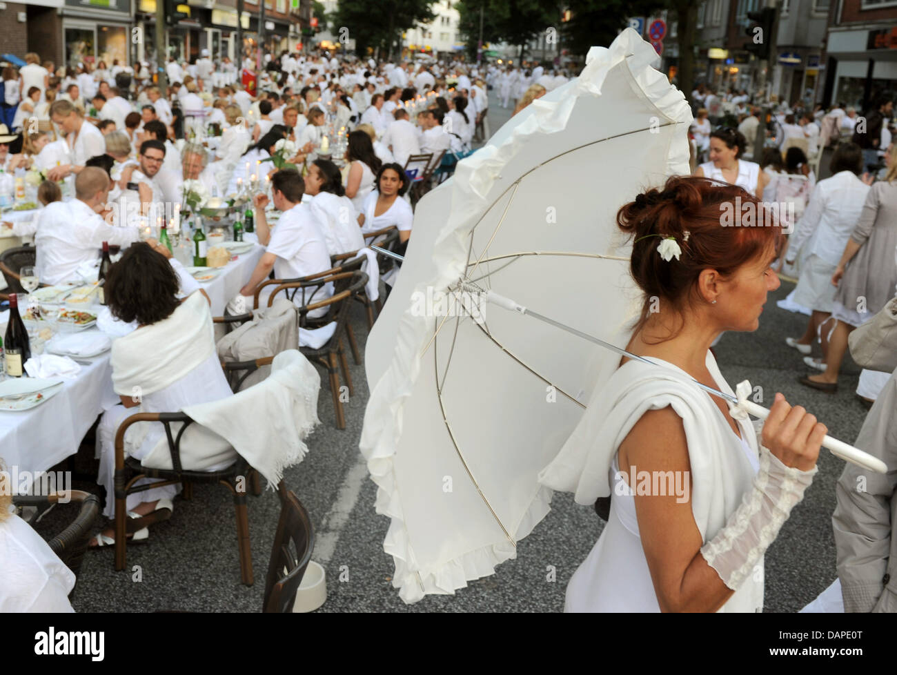 People dressed in white hi-res stock photography and images - Alamy