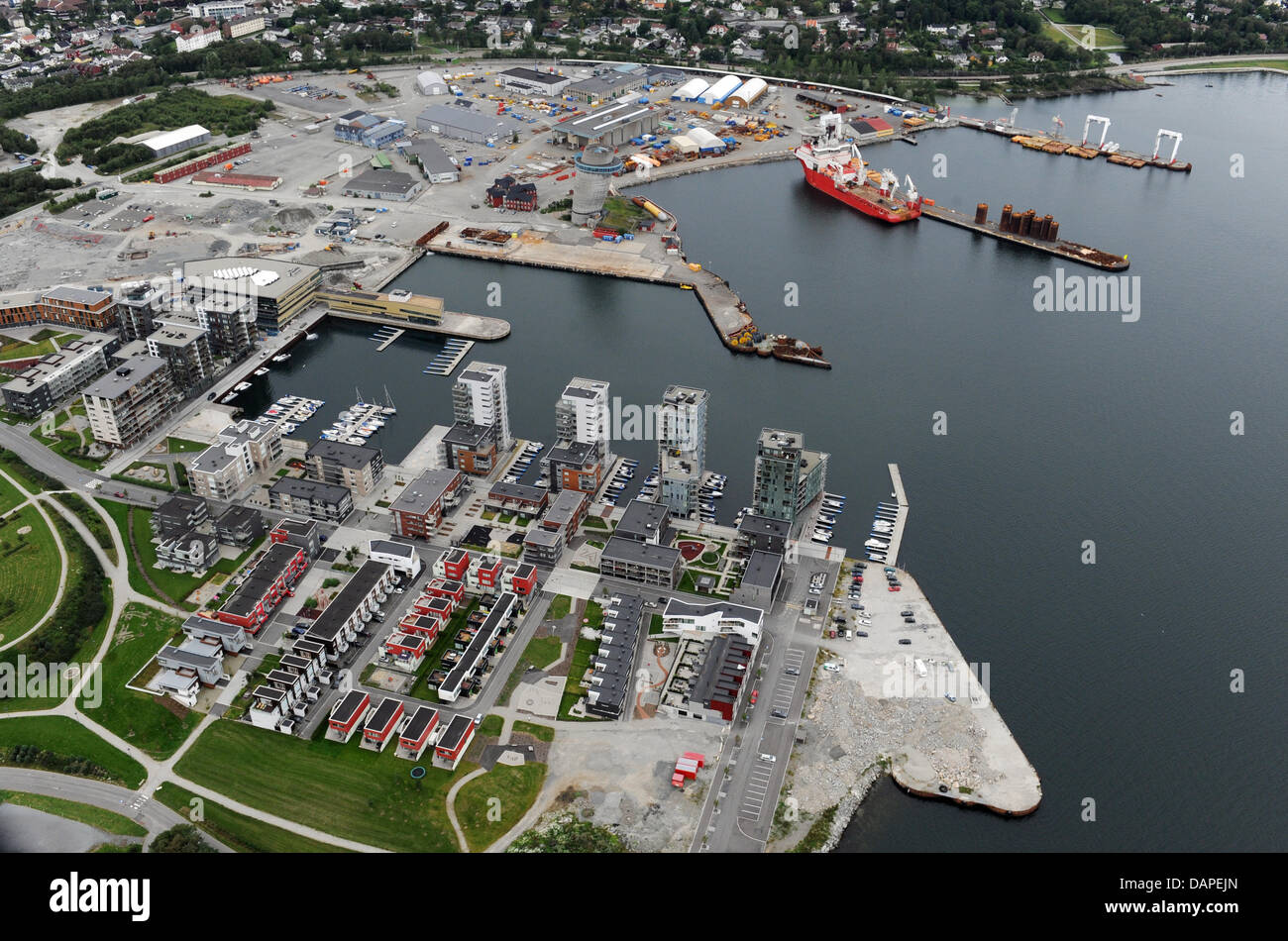An aerial view of a residential area with a small adjacent harbour in ...