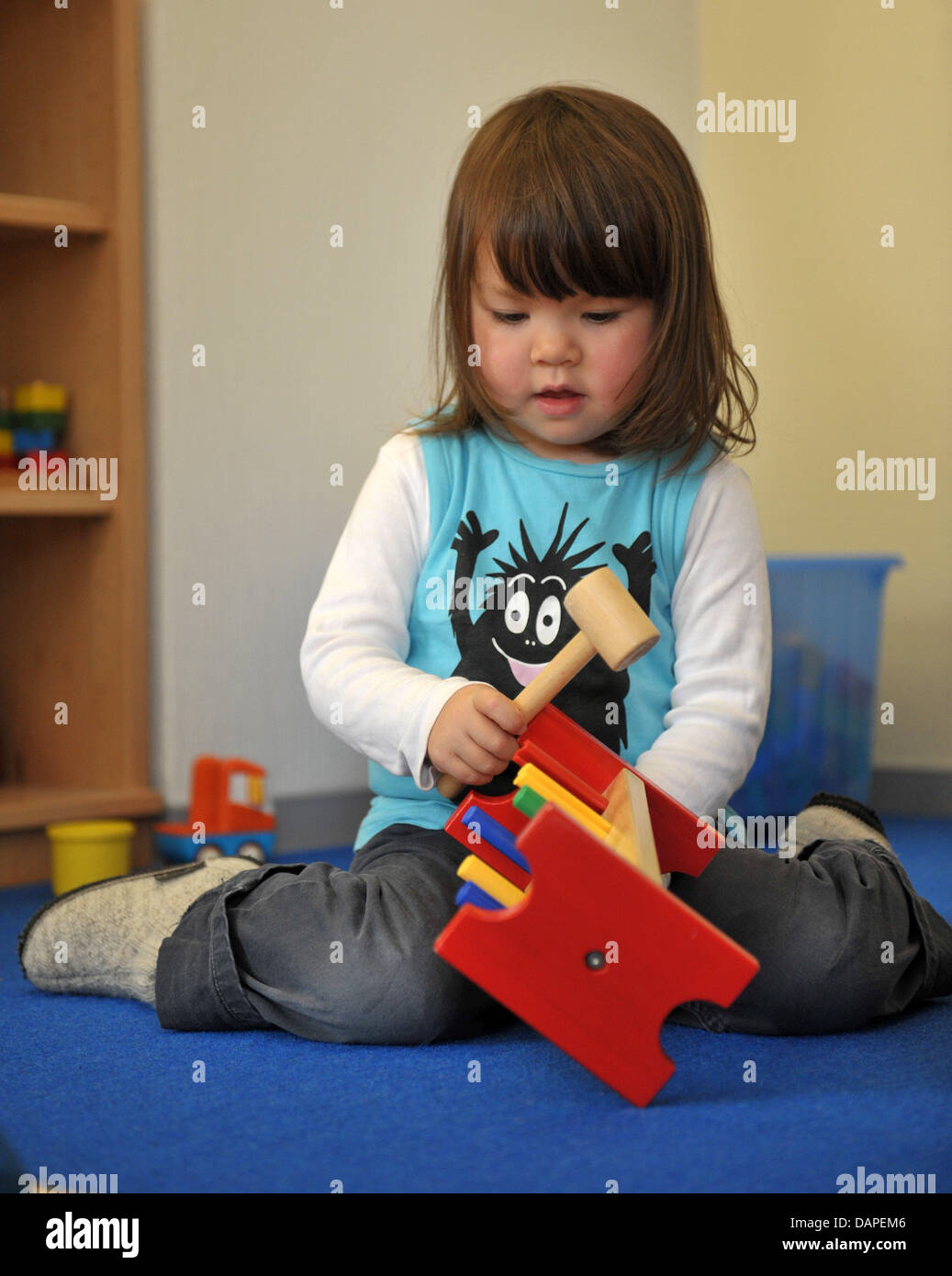 The three-year-old German-Chinese girl Olivia plays inside the newly ...