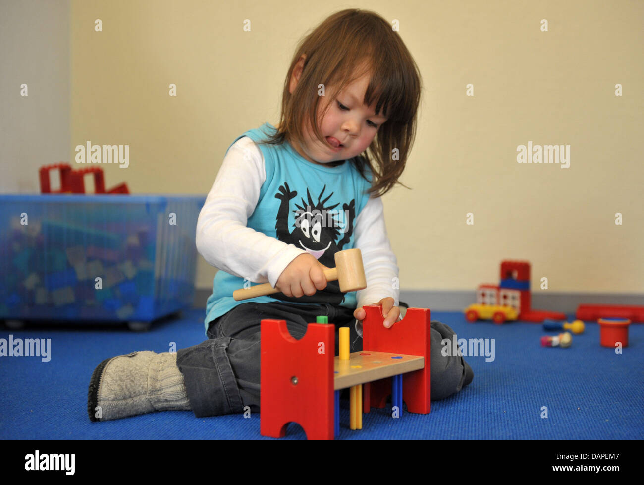 The three-year-old German-Chinese girl Olivia plays inside the newly ...