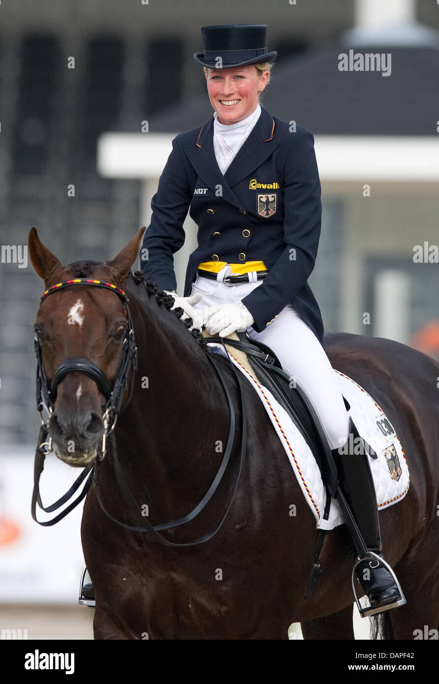 German dressage rider Helen Langehanenberg rides her horse Damon Hill ...