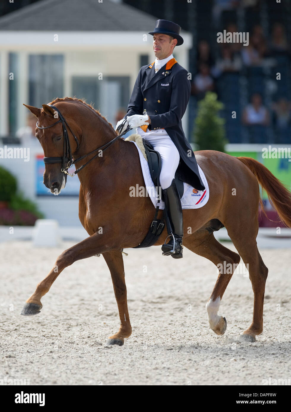 Dutch dressage rider Hans Peter Minderhoud performs his skills with his ...