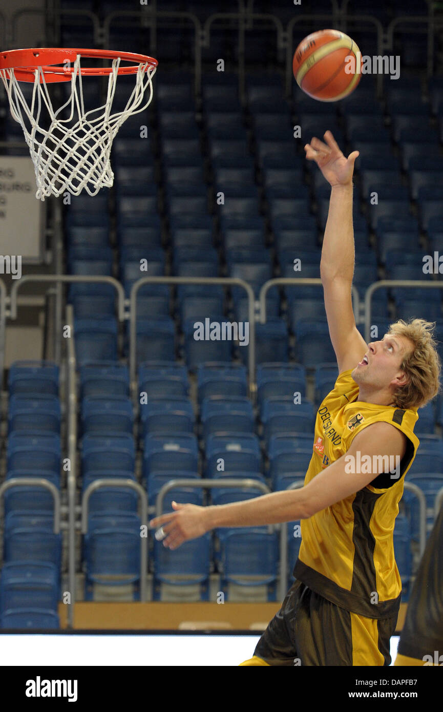 German basketball player Dirk Nowitzki performs a lay-up during a ...