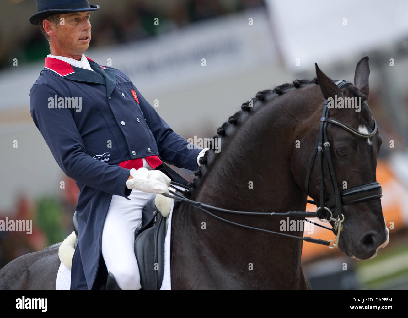 British dressage rider Carl Hester performs his skills with his horse ...