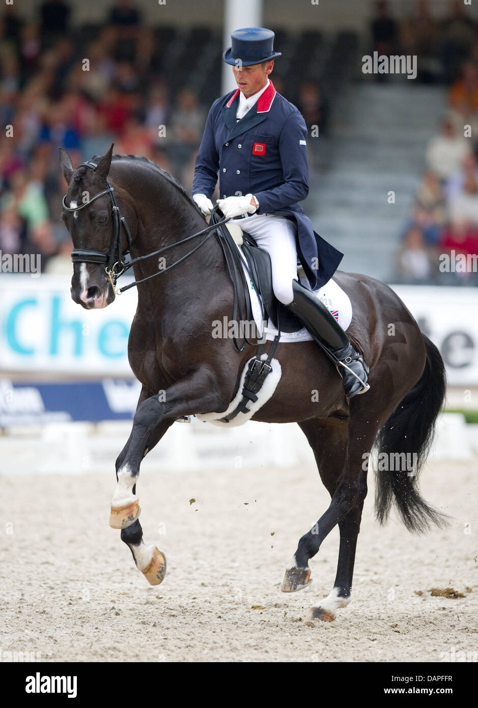 British dressage rider Carl Hester performs his skills with his horse ...