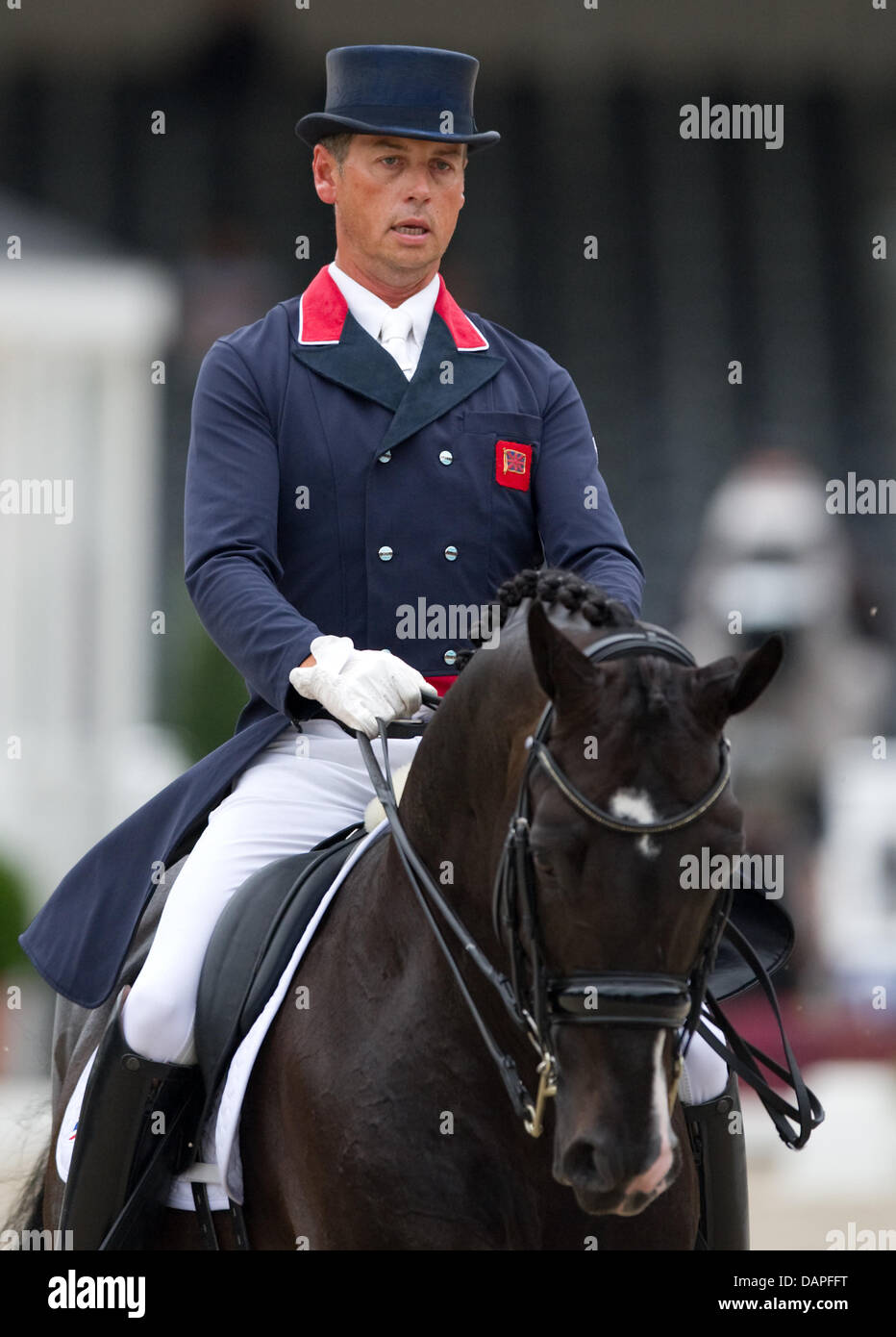 British dressage rider Carl Hester performs his skills with his horse ...