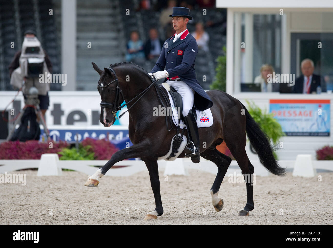 British dressage rider Carl Hester performs his skills with his horse ...