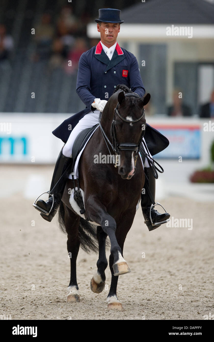 British dressage rider Carl Hester performs his skills with his horse ...
