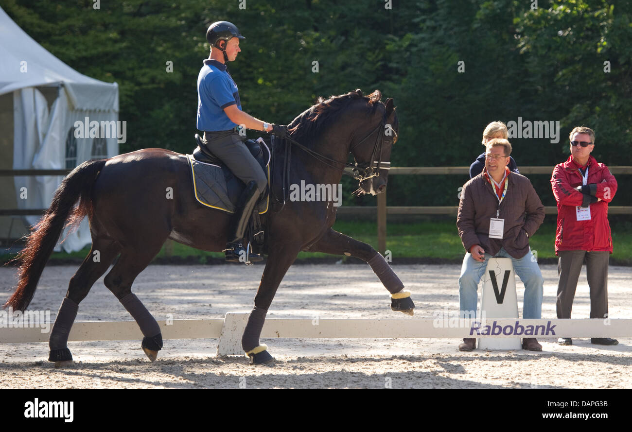 German dressage rider Matthias Alexander Rath on his horse Totilas (l-r ...
