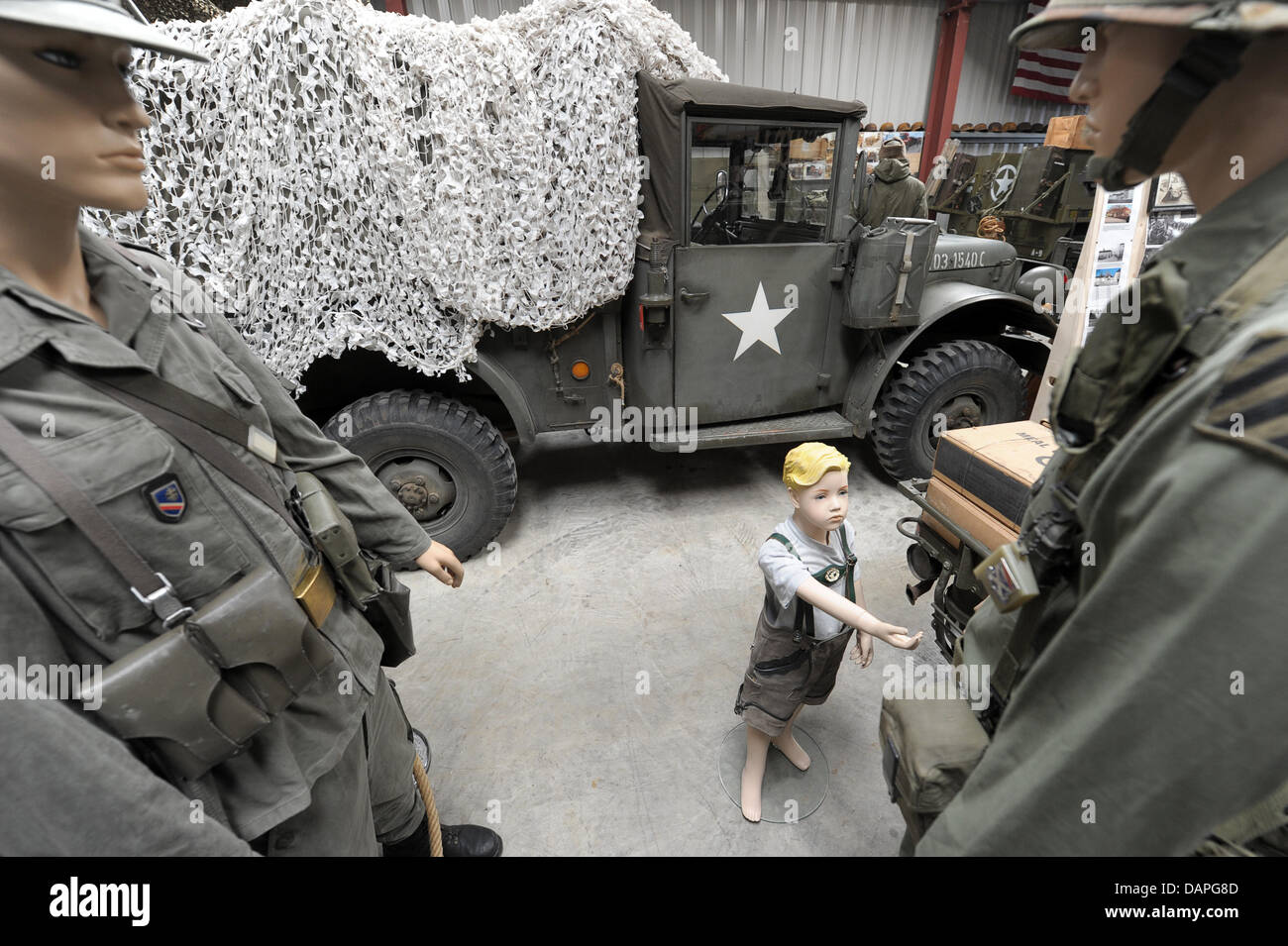 Two dummies are arranged to play the scene of an US army officer ...