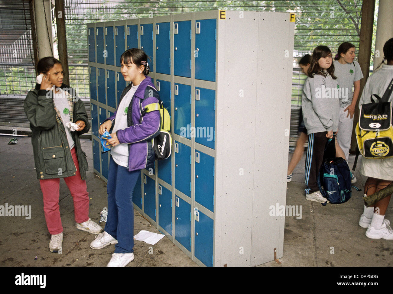 secondary school girls standing around lockers Stock Photo - Alamy