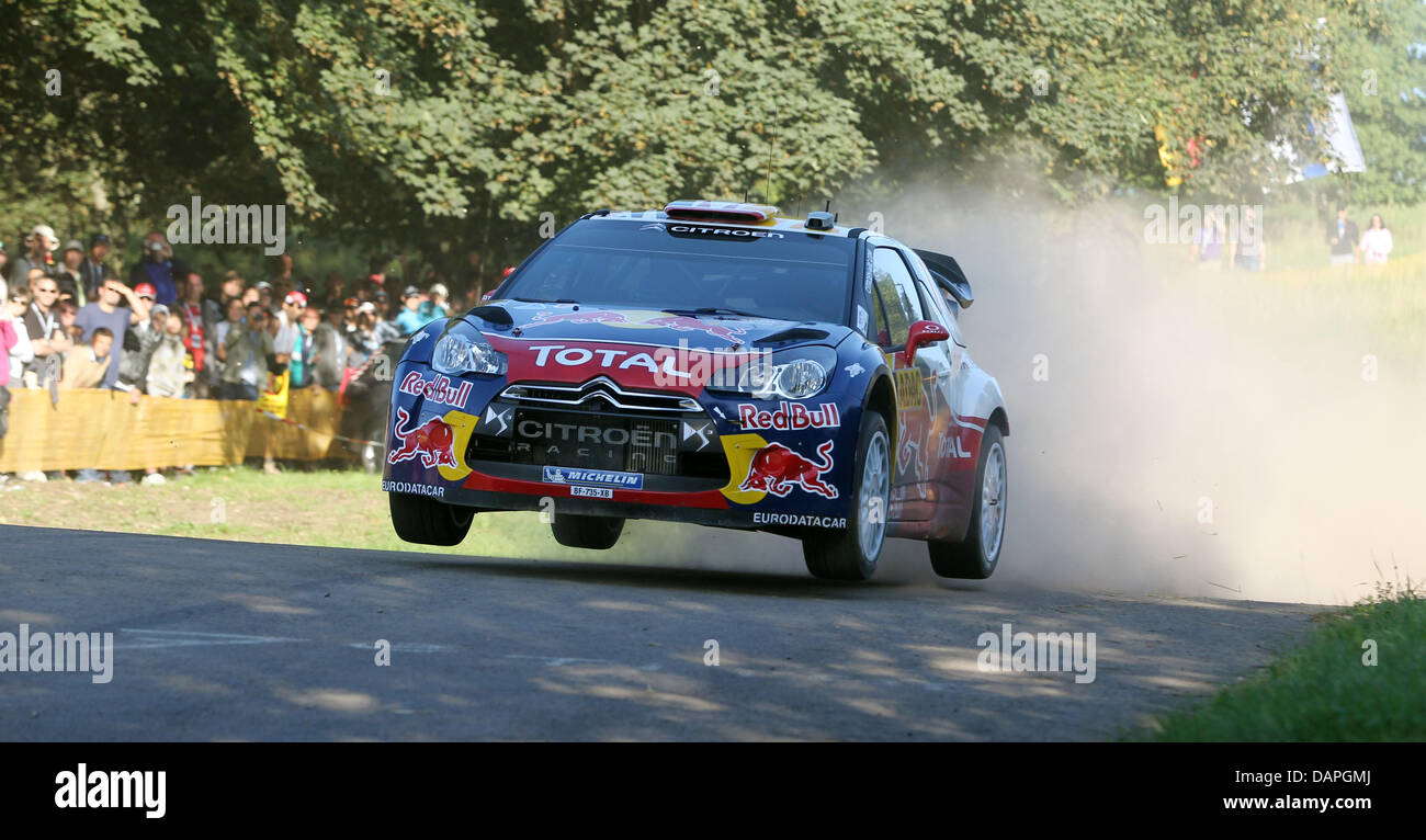 French rallye driver Sebastien Loeb and his co-pilot Daniel Elena race ...