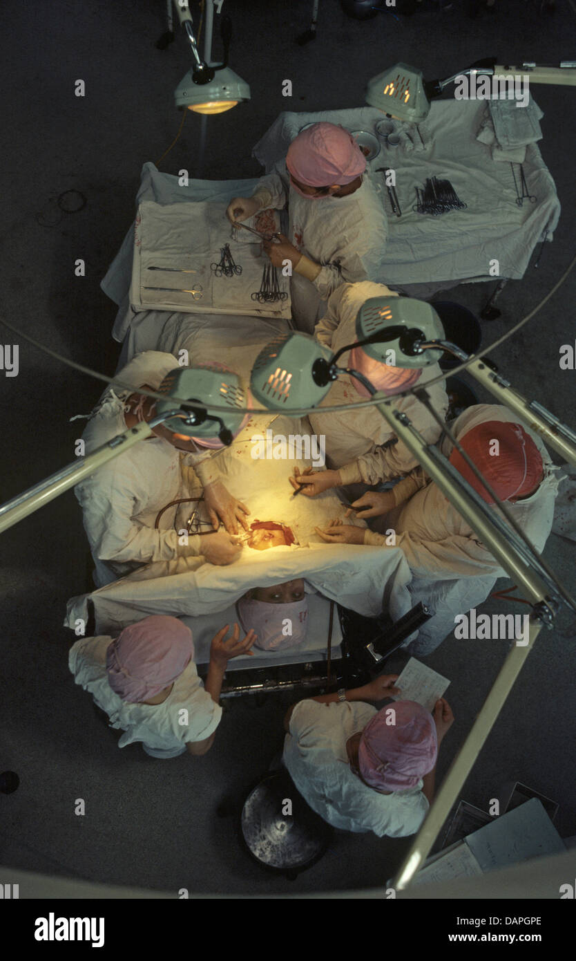 throat operation while patient still awake using acupuncture to ...