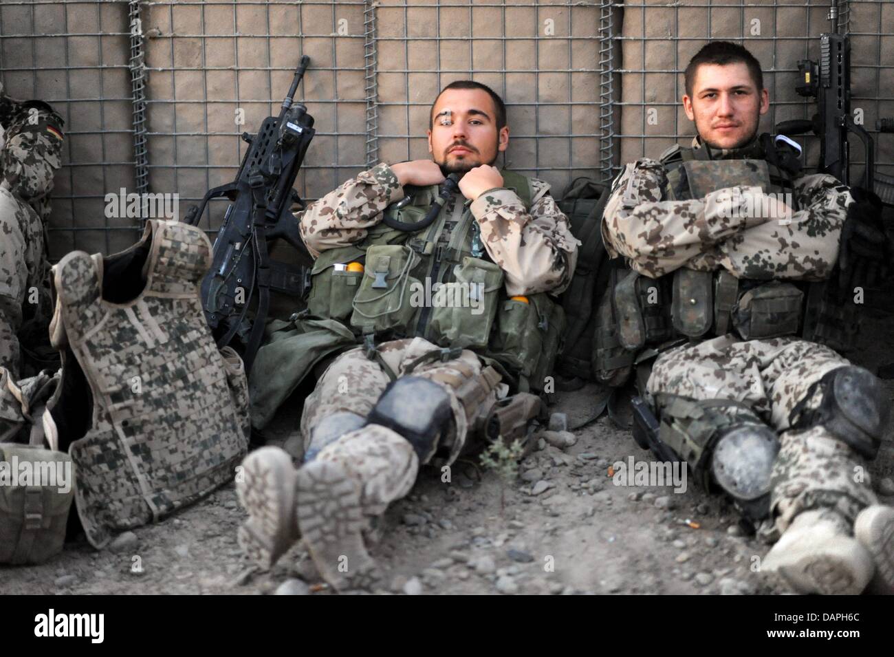 German Bundeswehr soldiers take a break at an outpost of the Local ...