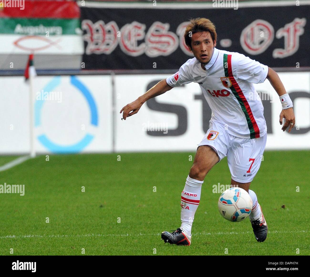 Augsburgs Hajime Hosogai plays during the Bundesliga soccer match ...